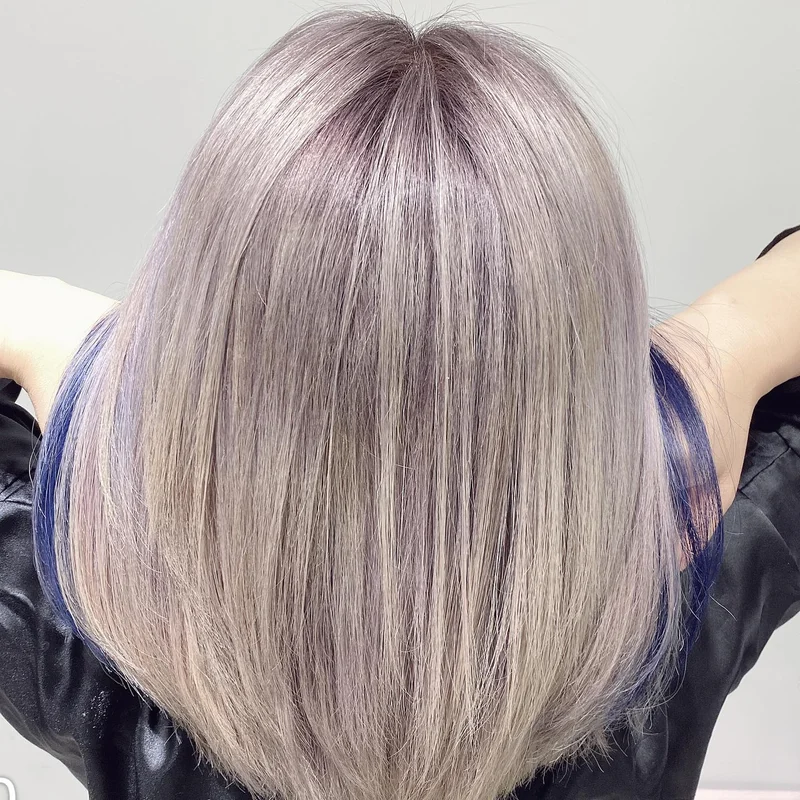 Pastel Ash Blonde with Peekaboo Blue Highlights | Goodhands Hair Salon ...