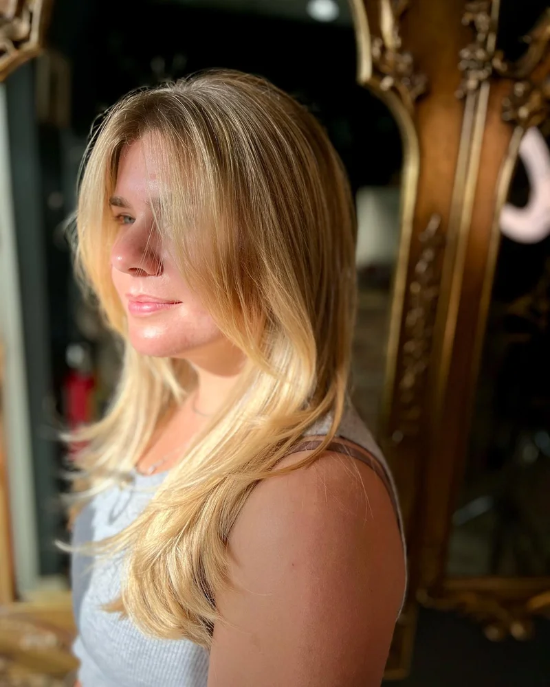 Long Blonde Layered Shag with Curtain Bangs | Studio 703 Hair Salon ...